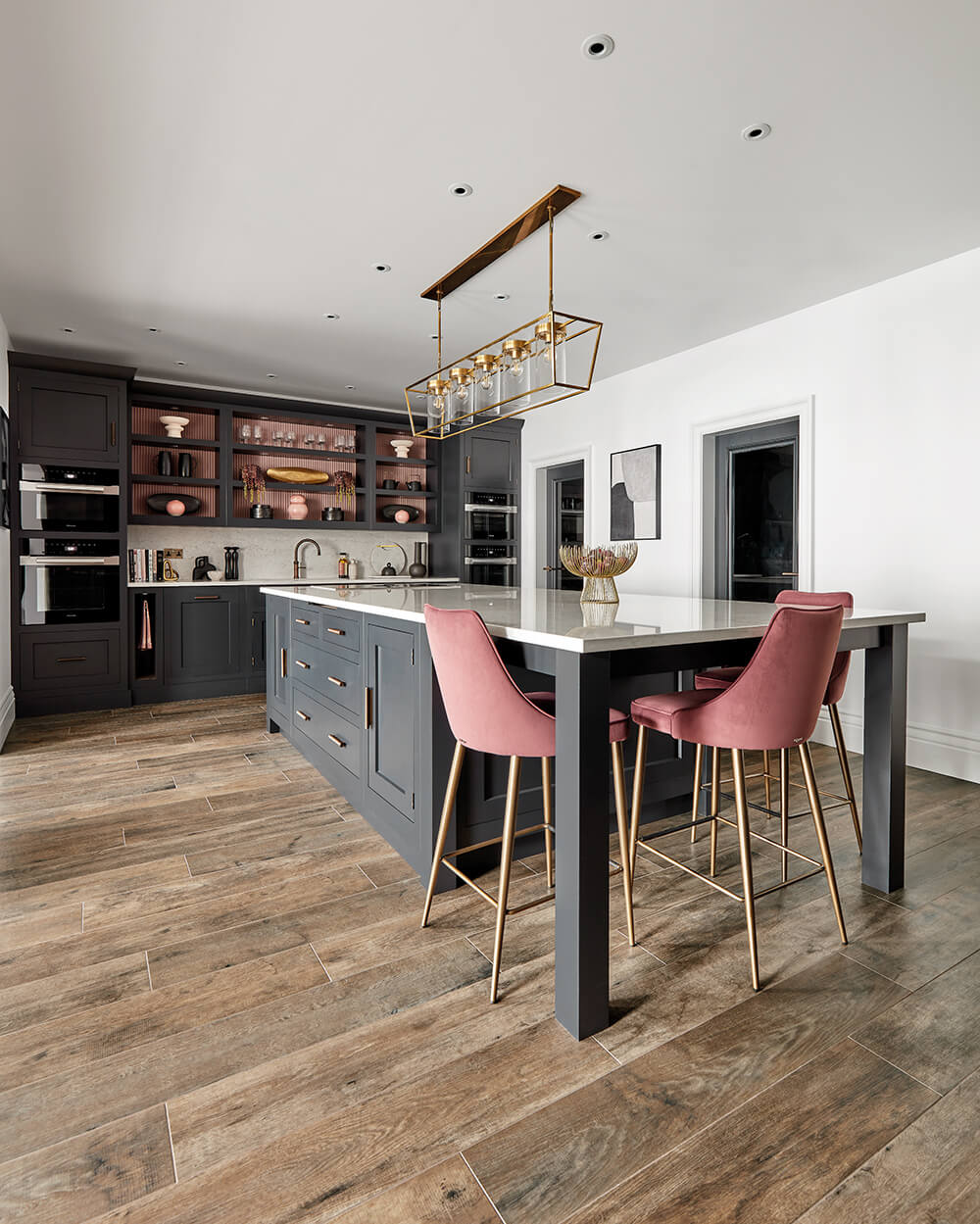 Pink and Black Kitchen Designed for Culinary Creation